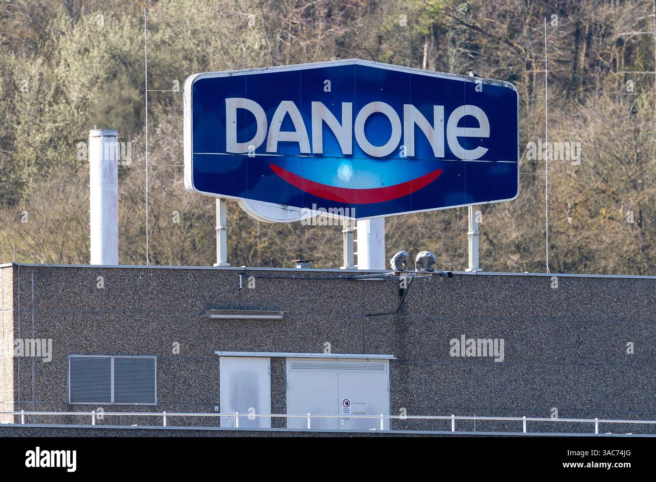 Ochsenfurt, Germany. 03rd Apr, 2025. The logo of the Danone milk plant ...