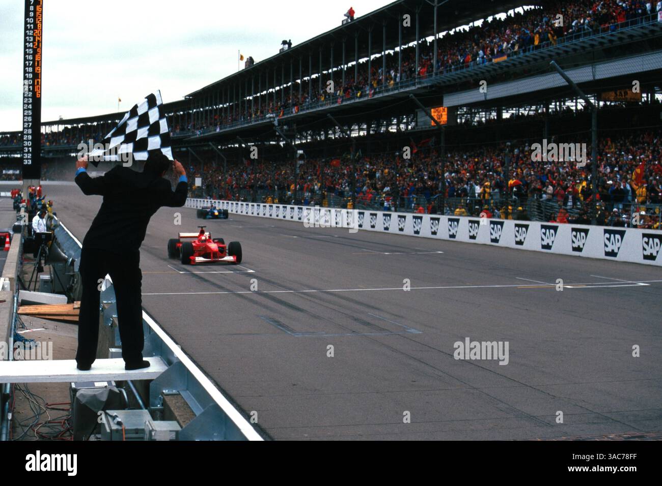 Michael Schumacher(GER) Ferrari F1 2000 takes the flag to win..USA ...