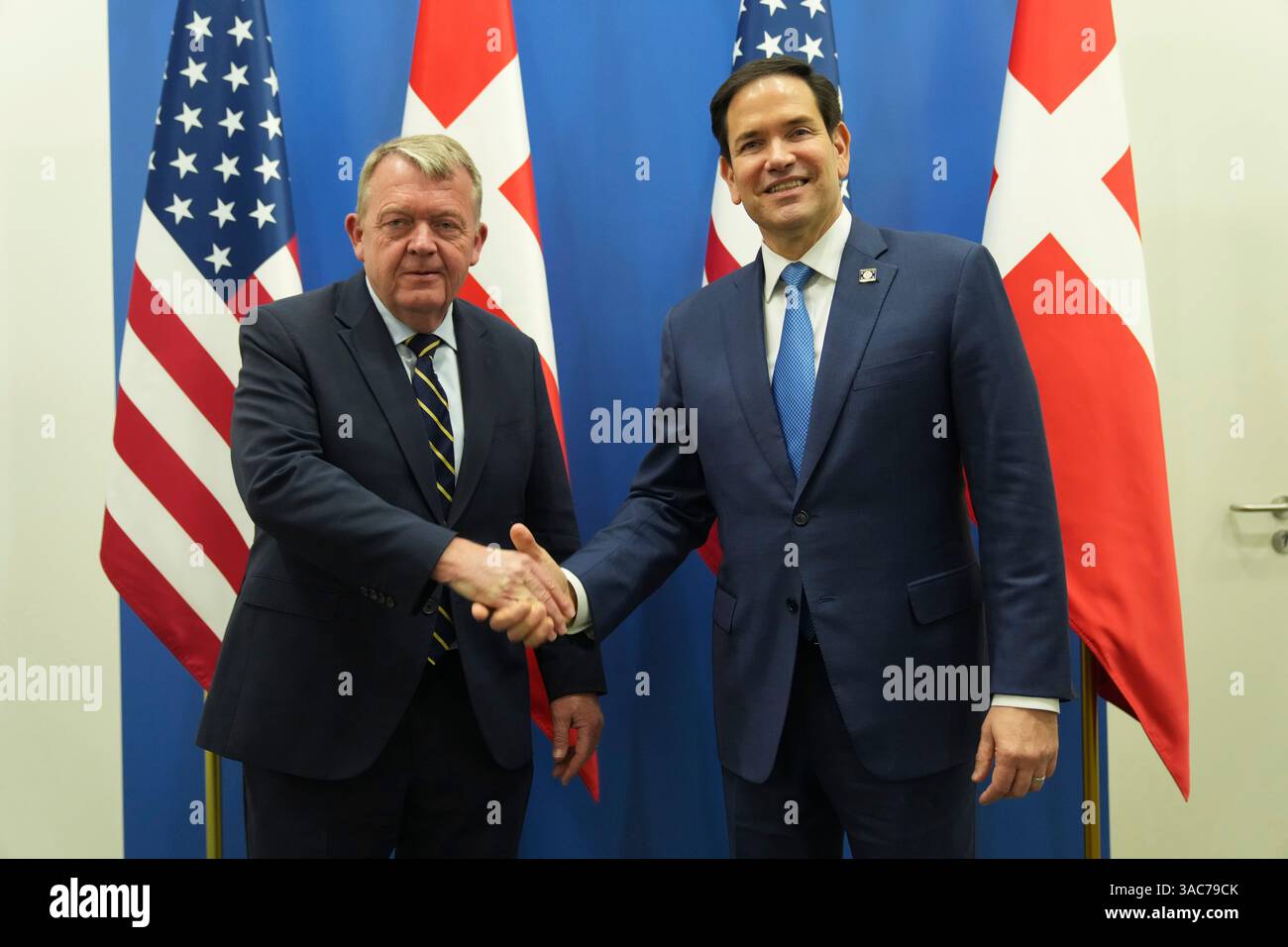 U.S. Secretary of State Marco Rubio, right, shakes hands with Denmark's ...