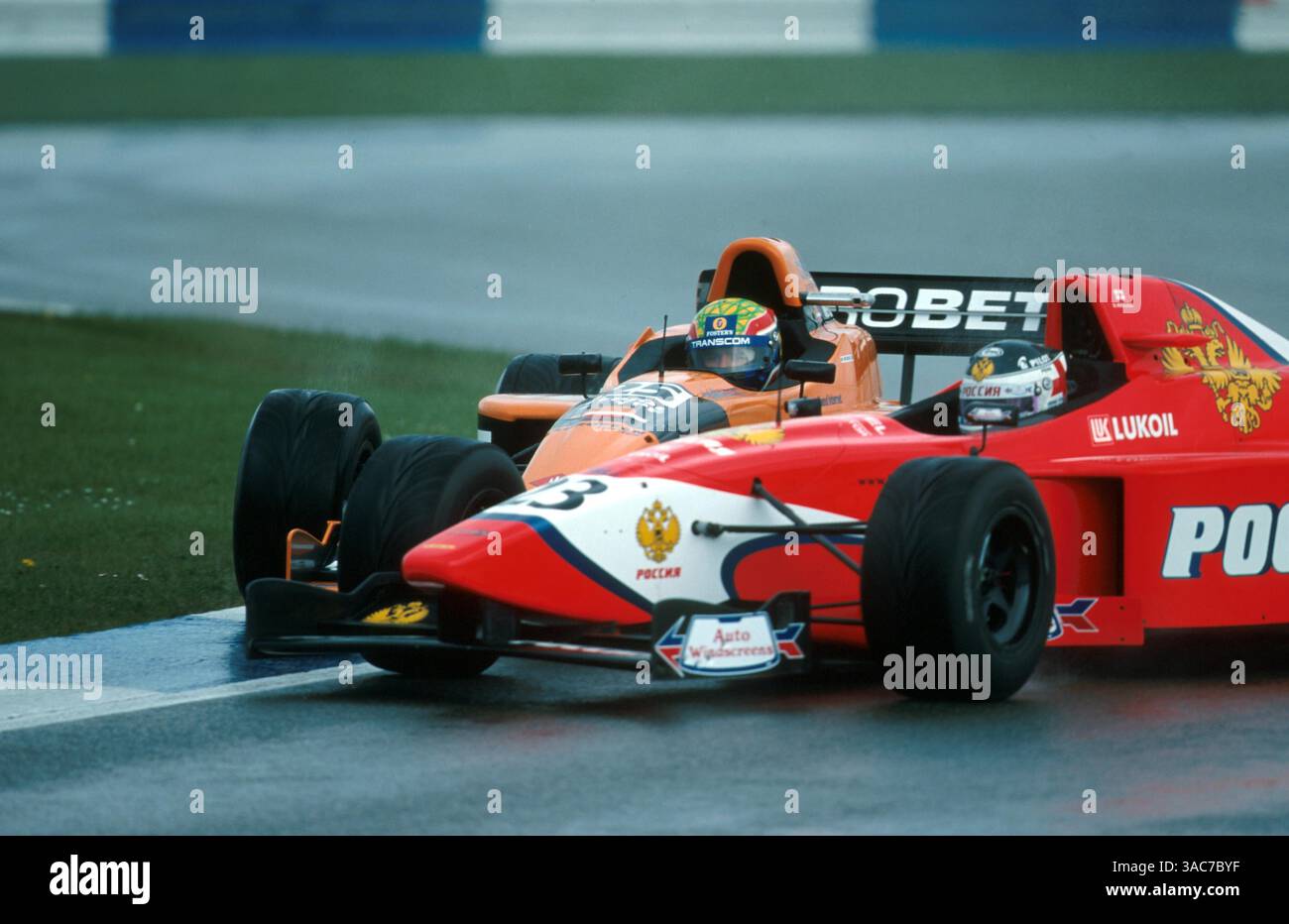 Darren Manning (GBR) collides with race winner Mark Webber (AUS ...