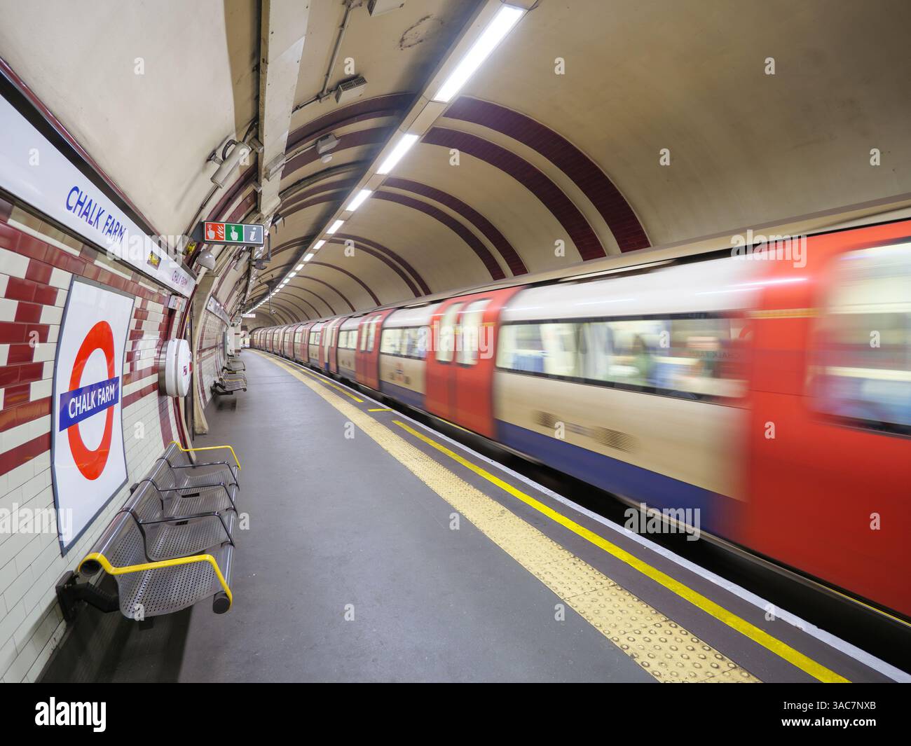 Motion blur of train speeding out of Chalk Farm London Underground ...