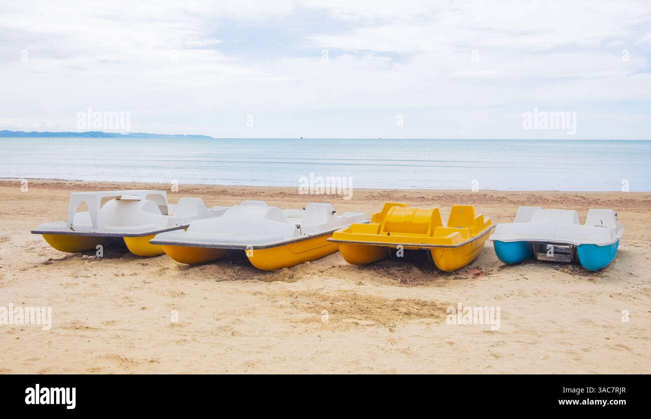 Colorful pedalos on a beautiful tropical beach. Pedal boats on the ...