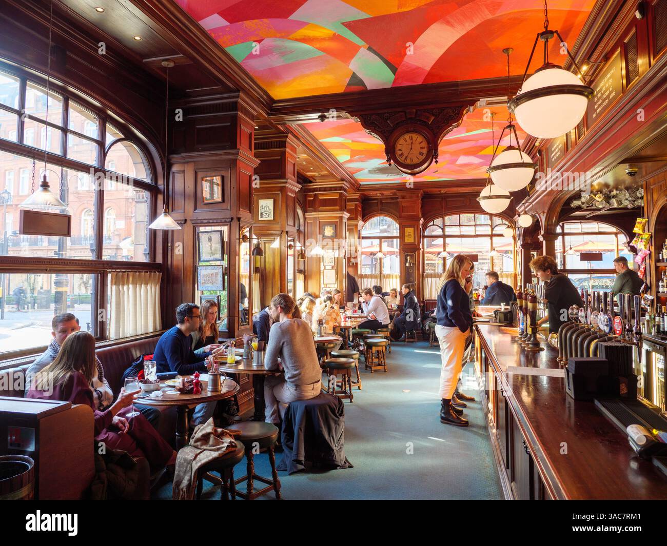 People inside The Audley pub at lunch time, in Mount Street, Mayfair ...