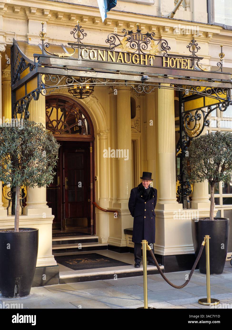 Doorman outside The Connaught Hotel, Mayfair, London, UK Stock Photo ...