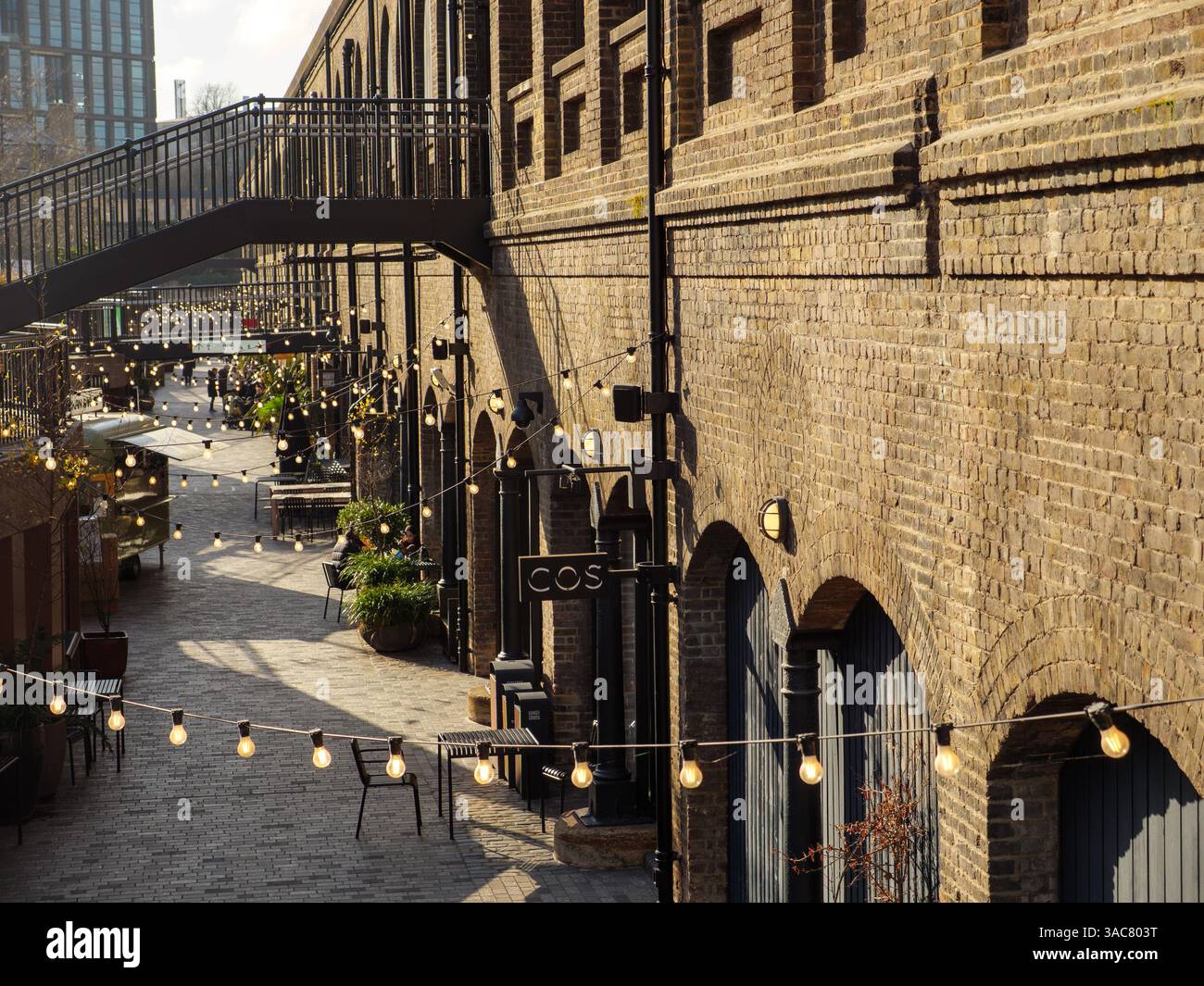 Shops and cafes in the arches of Coal Drops Yard, King's Cross, London ...