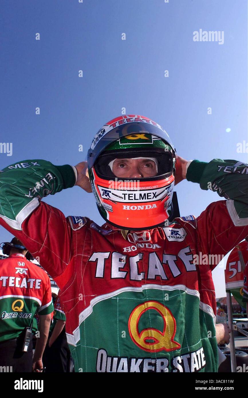 Adrian Fernandez, MEX, Reynard, Honda. Adrian straps on his helmet ...