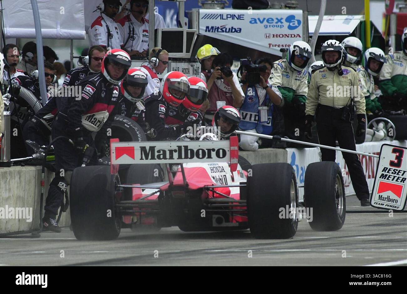 One of the Penske cars stops in the pits.CART World Series, Firestone ...