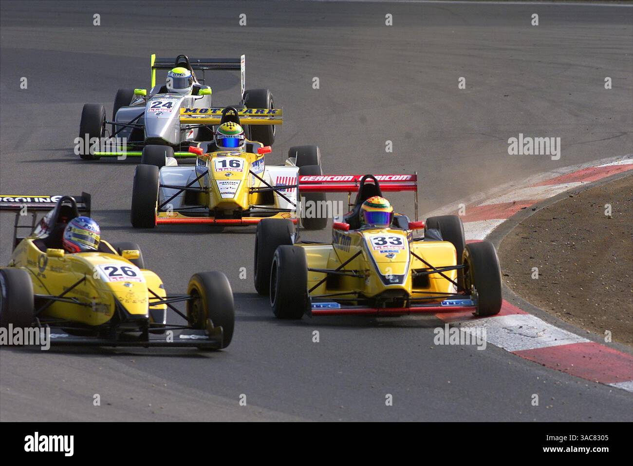 Vitantonio Liuzzi (ITA) dives down the inside of Marcel Lasee (GER ...