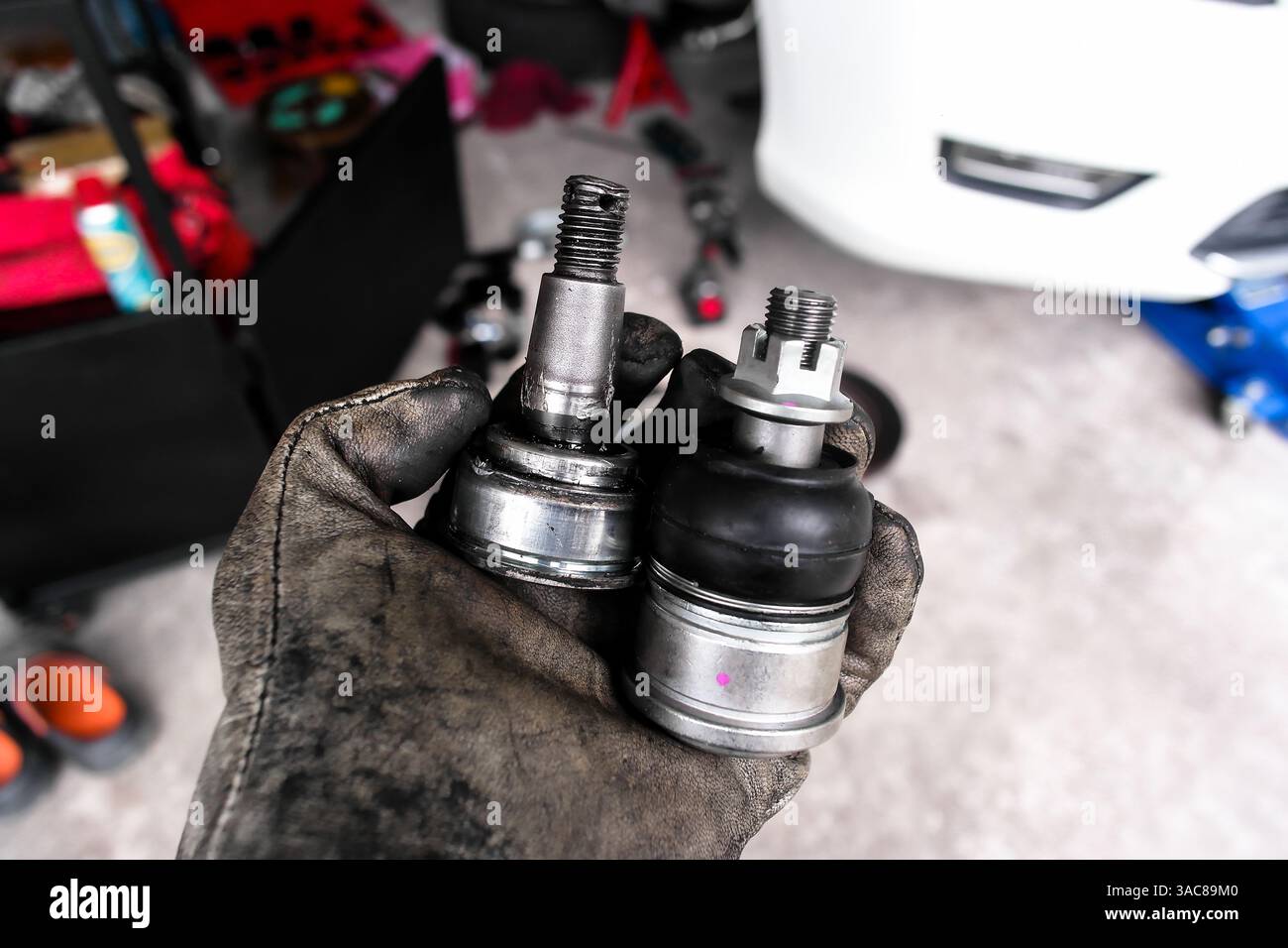 Car ball joints comparison new and old , Automotive repair concept ...