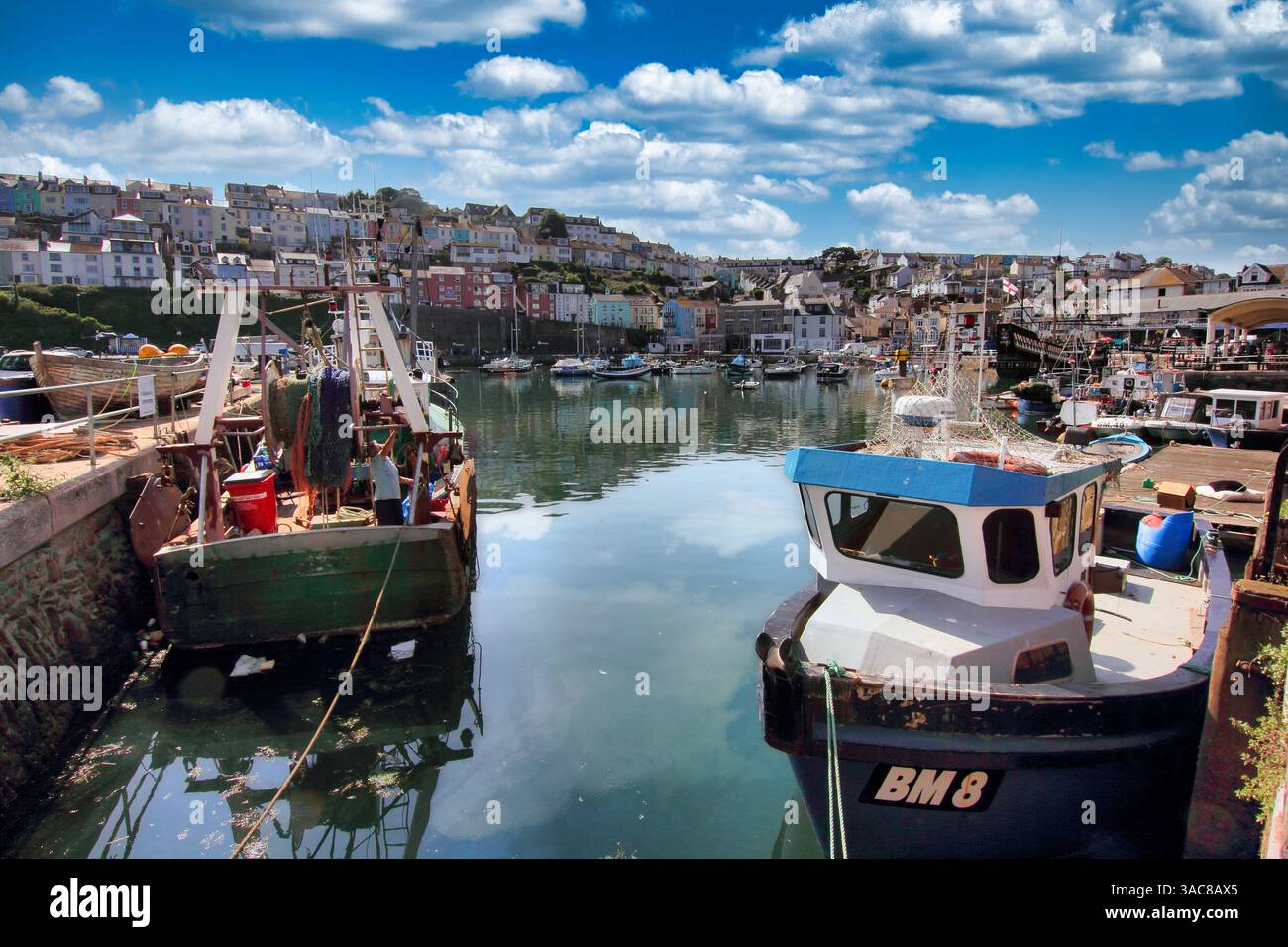 Brixham fishing boats alongside the quayside in the inner harbour of ...