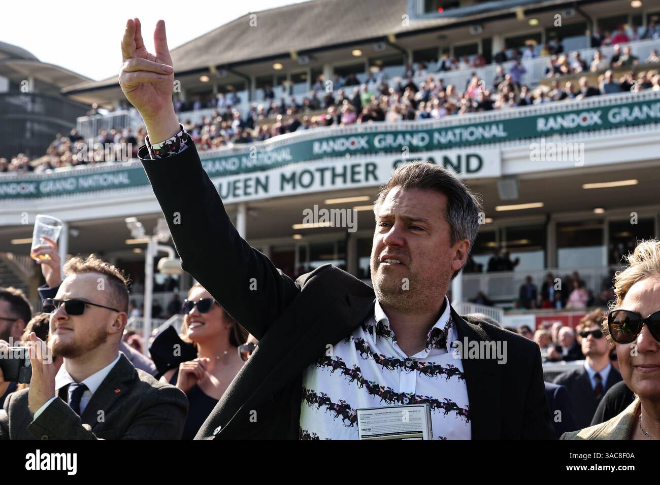 Racegoers during the Randox Grand National 2025 Day 1 Opening Day at ...