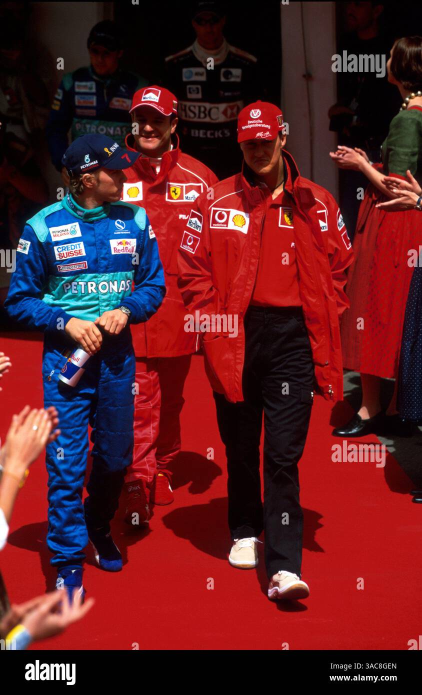 L-R: Nick Heidfeld (GER) Sauber, Rubens Barrichello (BRA) Ferrari, race ...