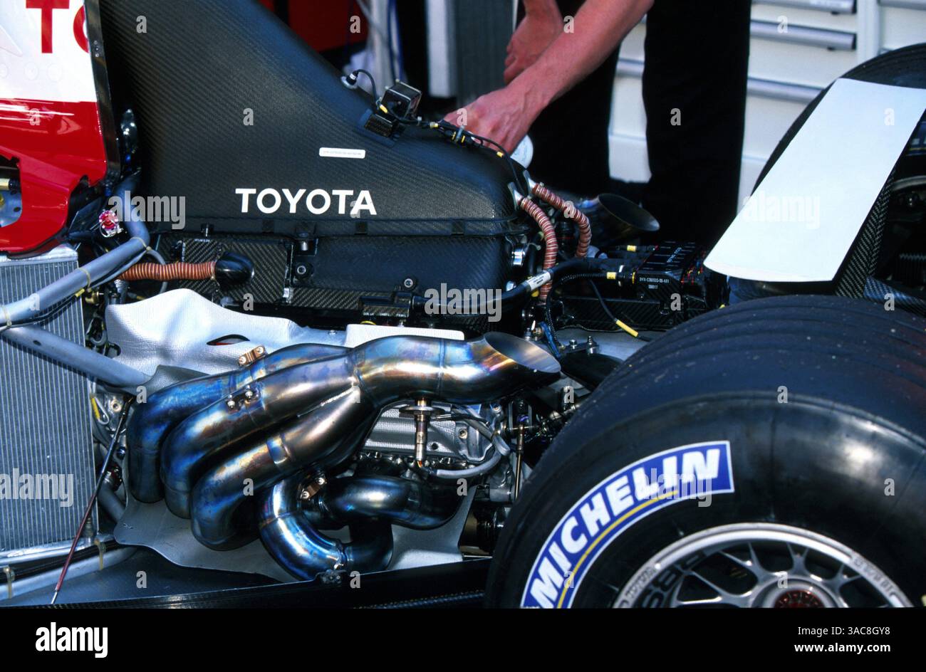 The Toyota V10 engine in the back of the Toyota TF102, showing exhausts ...