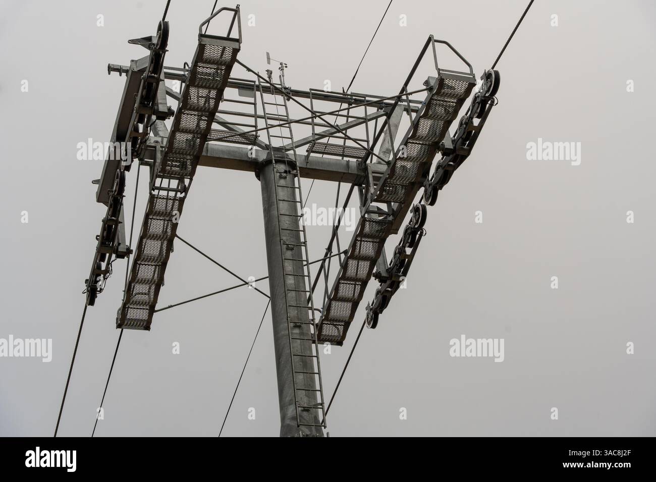 Support tower for a cable car chair lift on an overcast day Stock Photo ...