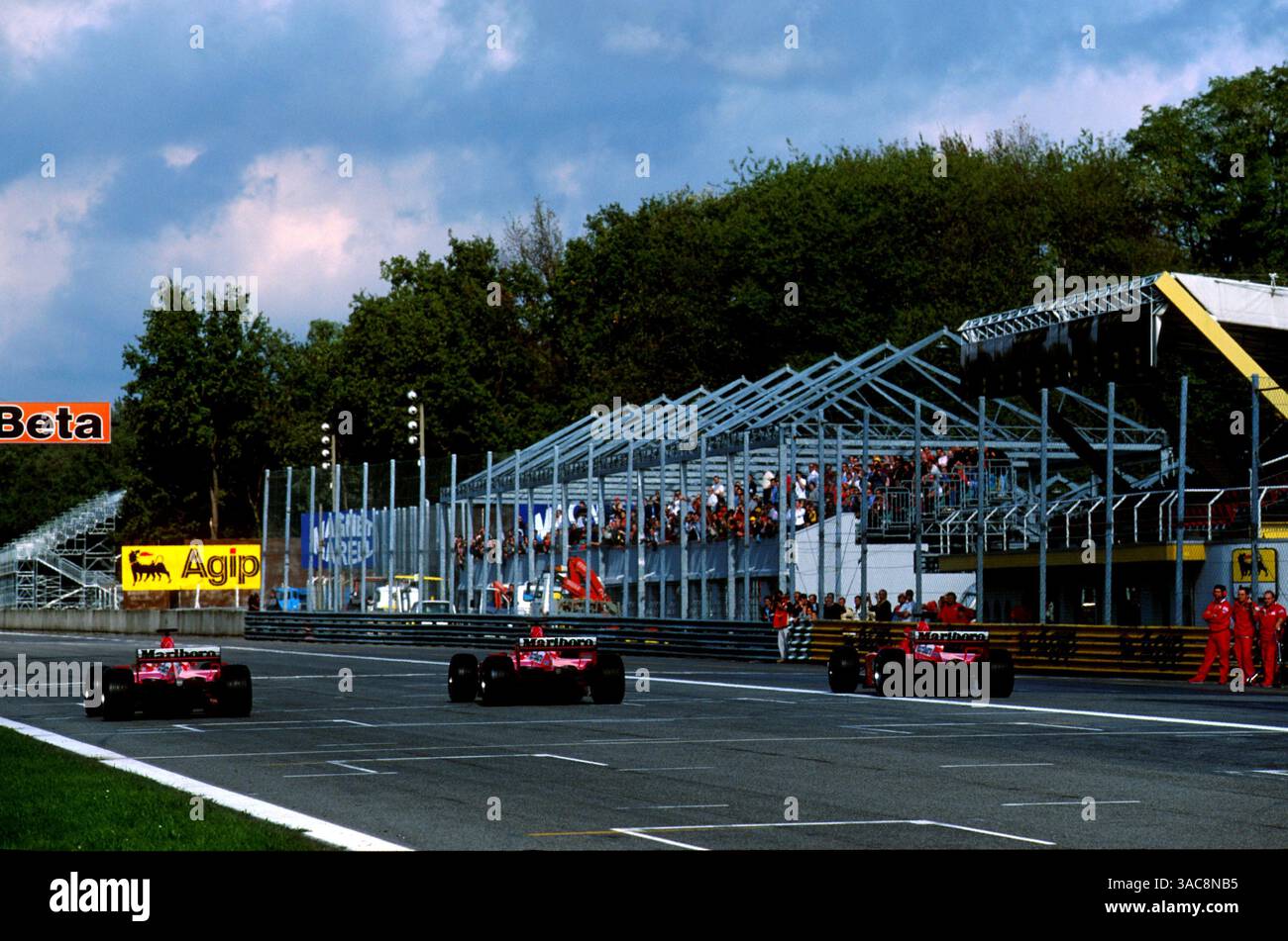 The Ferrari's of Michael Schumacher (GER), Rubens Barichello (BRA) and ...
