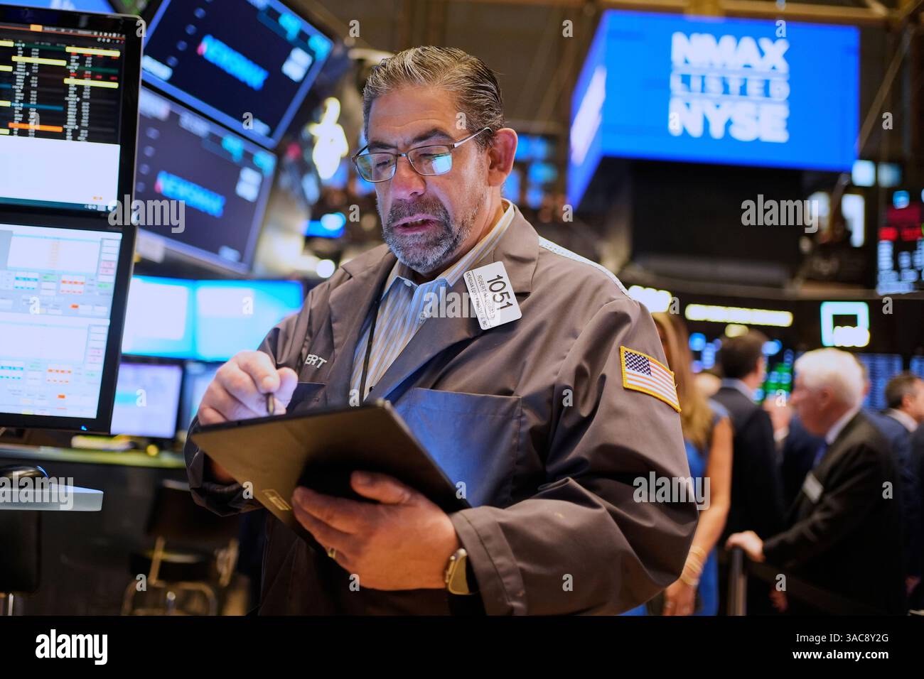 Robert Oswald works on the floor at the New York Stock Exchange in New ...