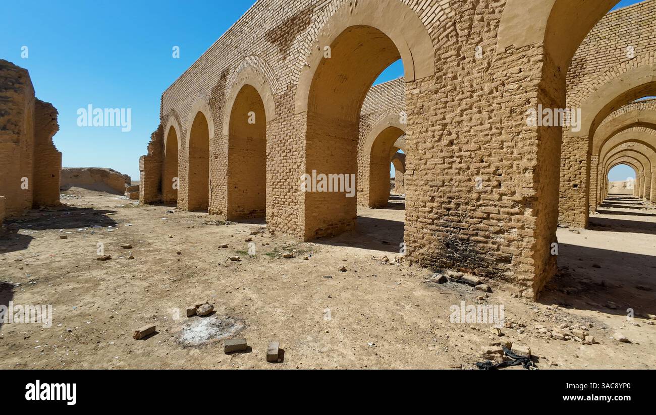 Ancient brick arches in a desert landscape under a clear blue sky Stock ...