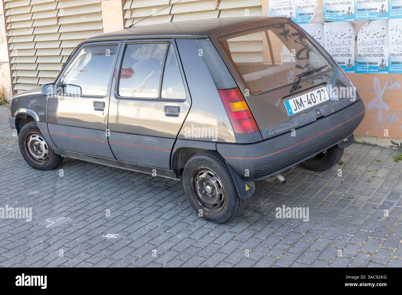 Old renault 5 gtl parked on a cobblestone street, showing signs of age ...