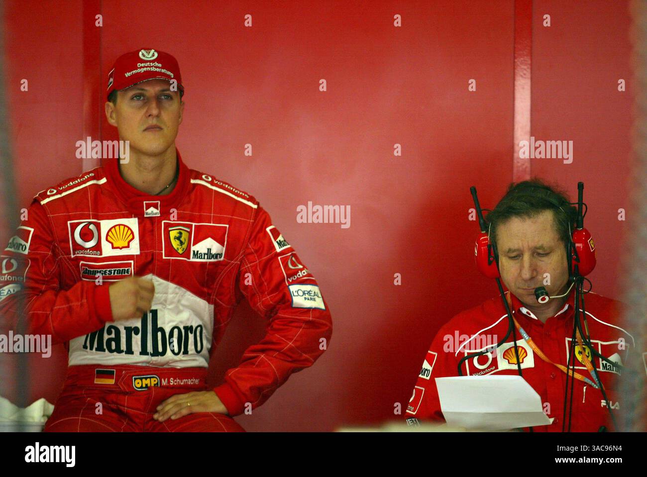 Michael Schumacher (GER) Ferrari F2001, with Ferrari team manager Jean ...