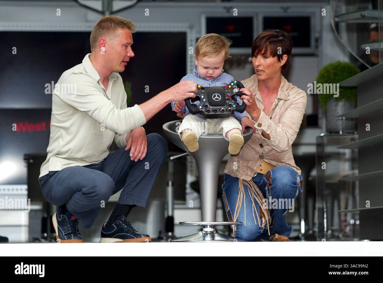Former World Champion Mika Hakkinen (FIN), left, with his son Hugo ...