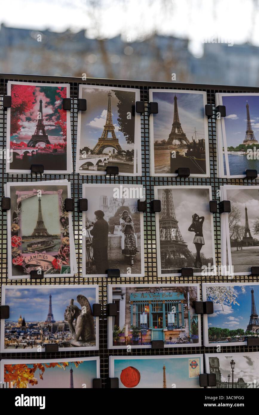 PARIS, FRANCE - 02/18/2025: A collection of postcards featuring the ...