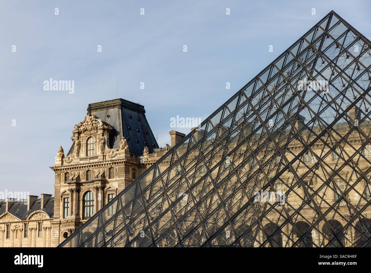 The Louvre Museum in Paris is home to the iconic glass pyramid, which ...