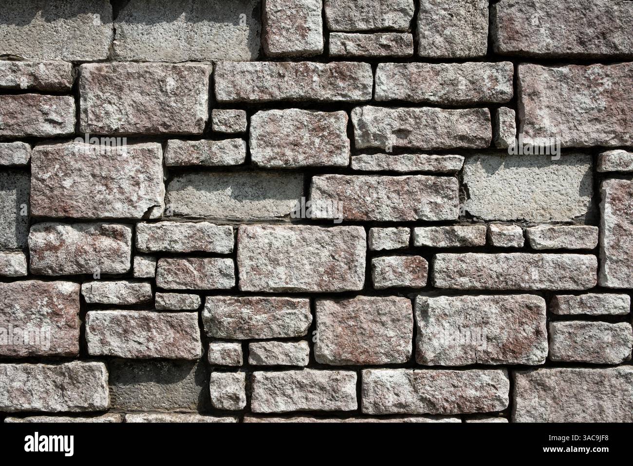 Concrete rectangular brick wall surface Stock Photo - Alamy