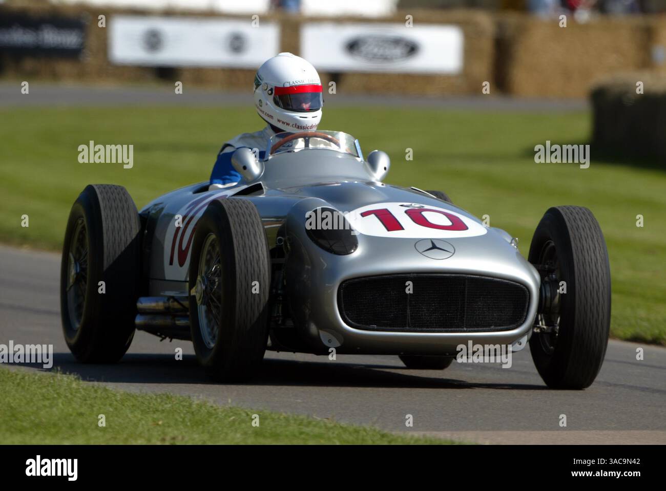 The 1955 Mercedes Benz W196 driven by Tony Dron (GBR)..Goodwood ...