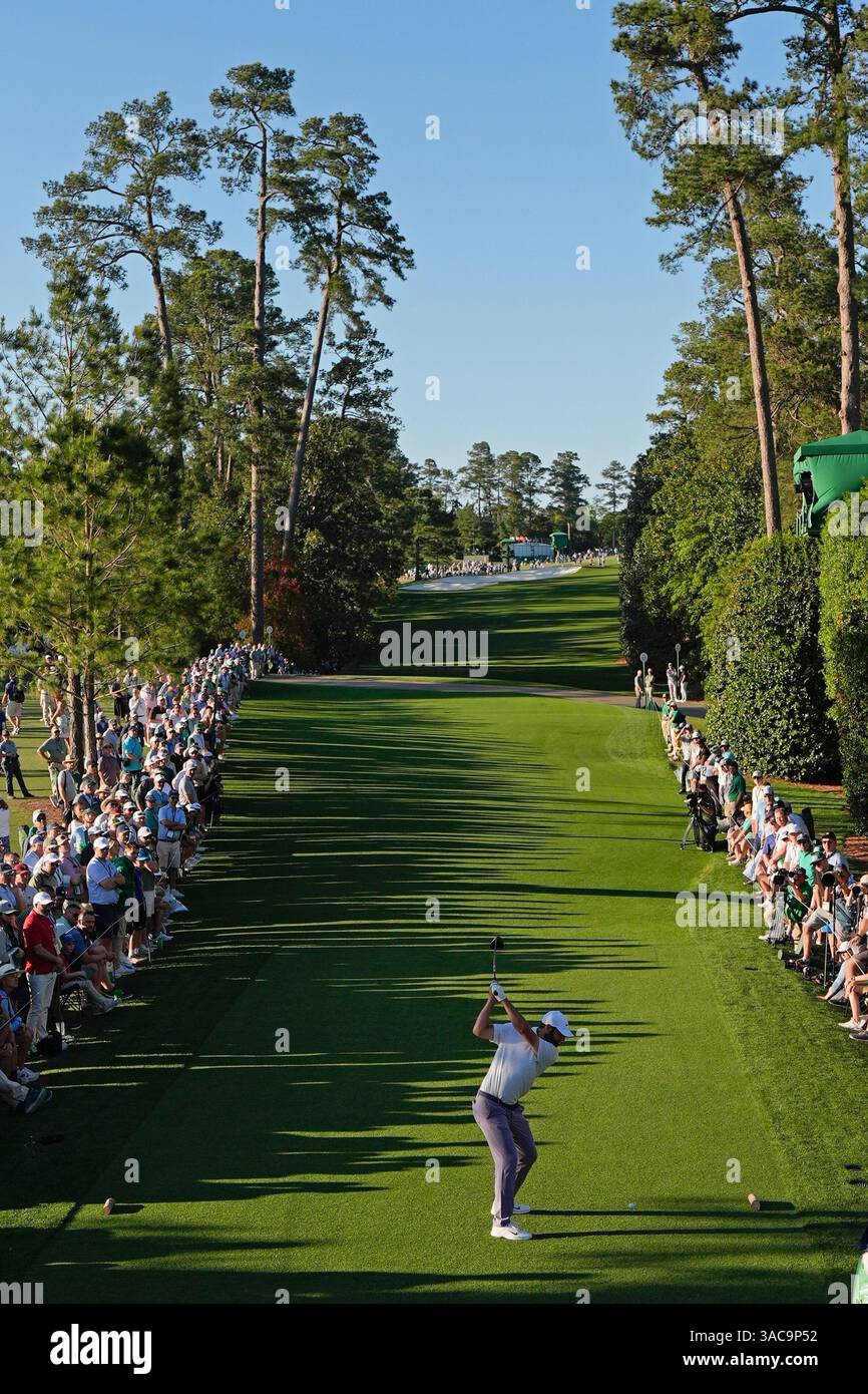 FILE - Scottie Scheffler hits his tee shot on the 18th hole during ...