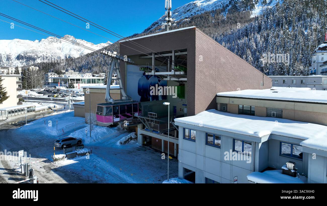 View of cable car gondola station Signalbahn in the town of St. Moritz ...