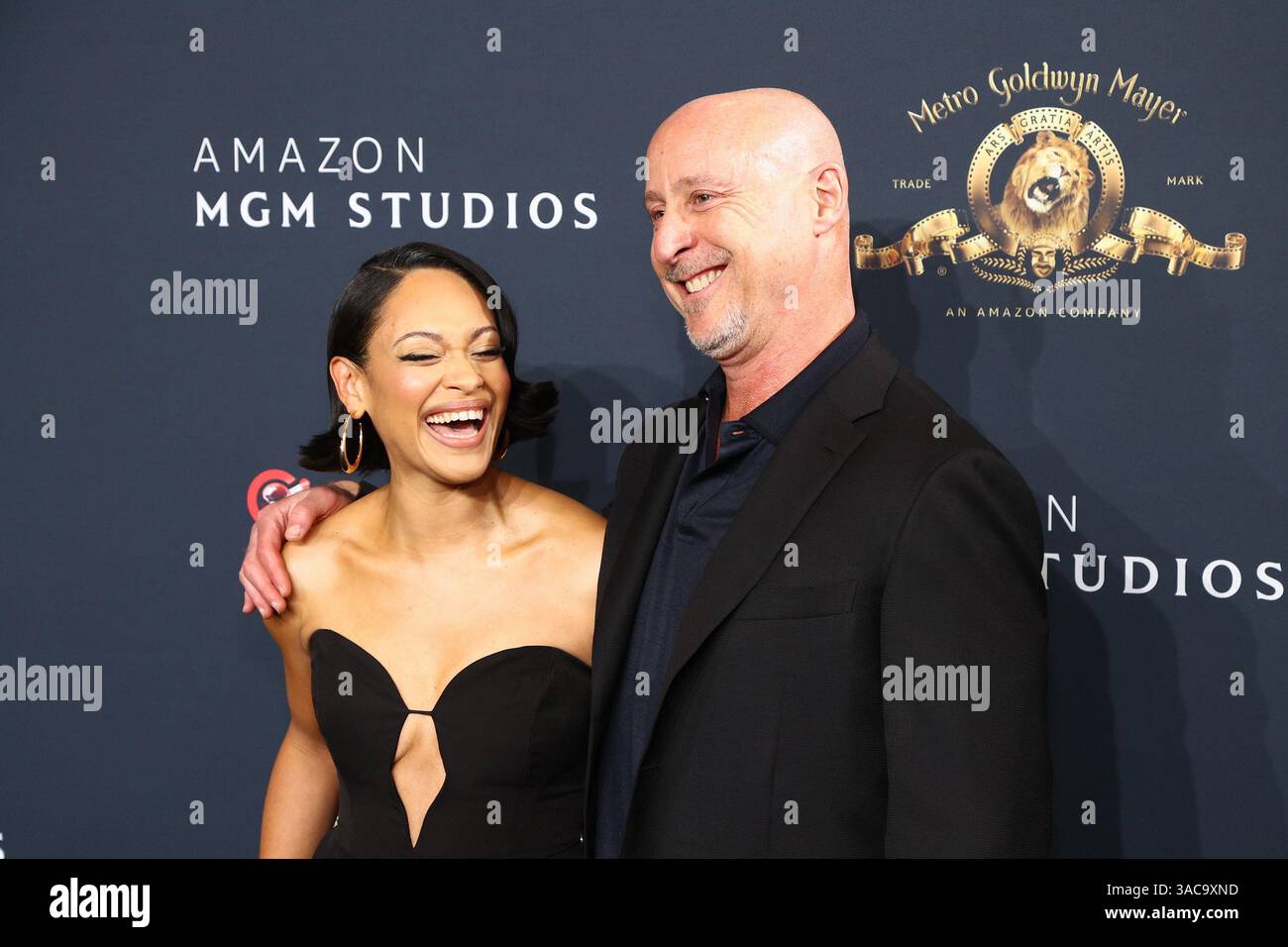 Cynthia Addai-Robinson, Director Gavin O Connor at arrivals for AMAZON ...