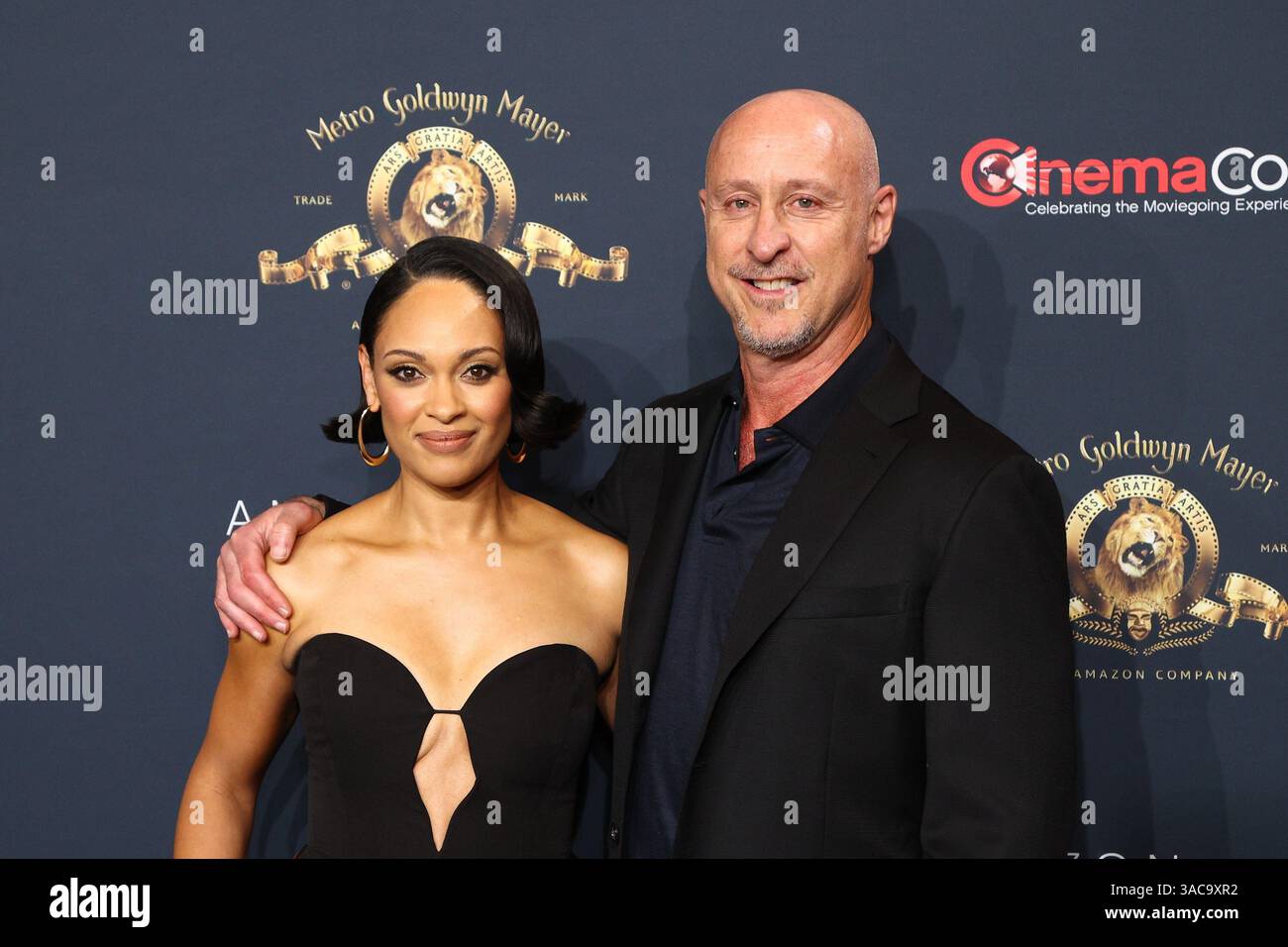 Cynthia Addai-Robinson, Director Gavin O Connor at arrivals for AMAZON ...