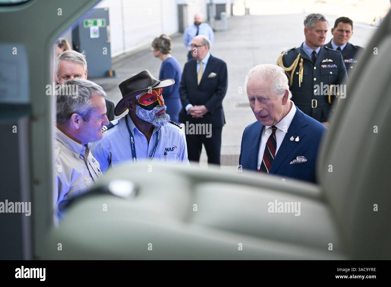 King Charles III inspects the Cessna with Pilot Joseph Tua during a ...
