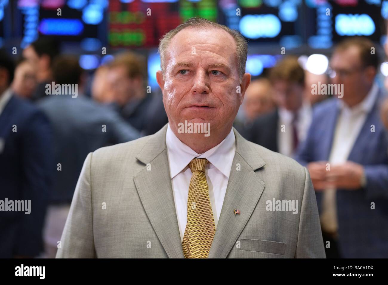 Newsmax CEO Christopher Ruddy poses for a picture on the floor at the ...