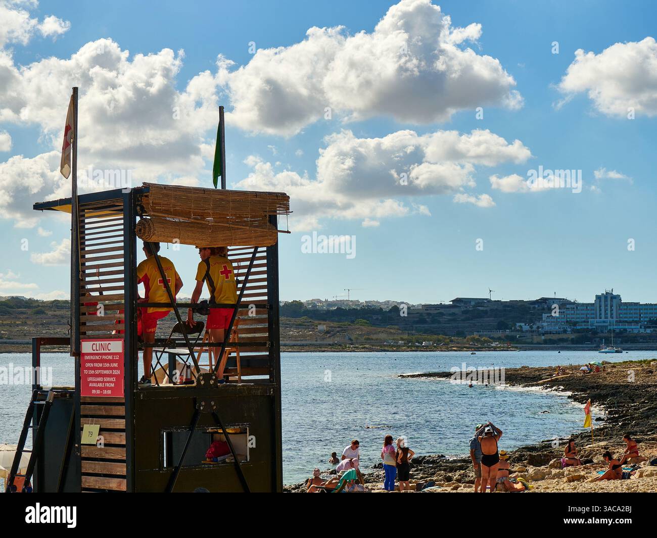 Lifeguard tower on the beach, people relax on the beach in Malta Stock ...
