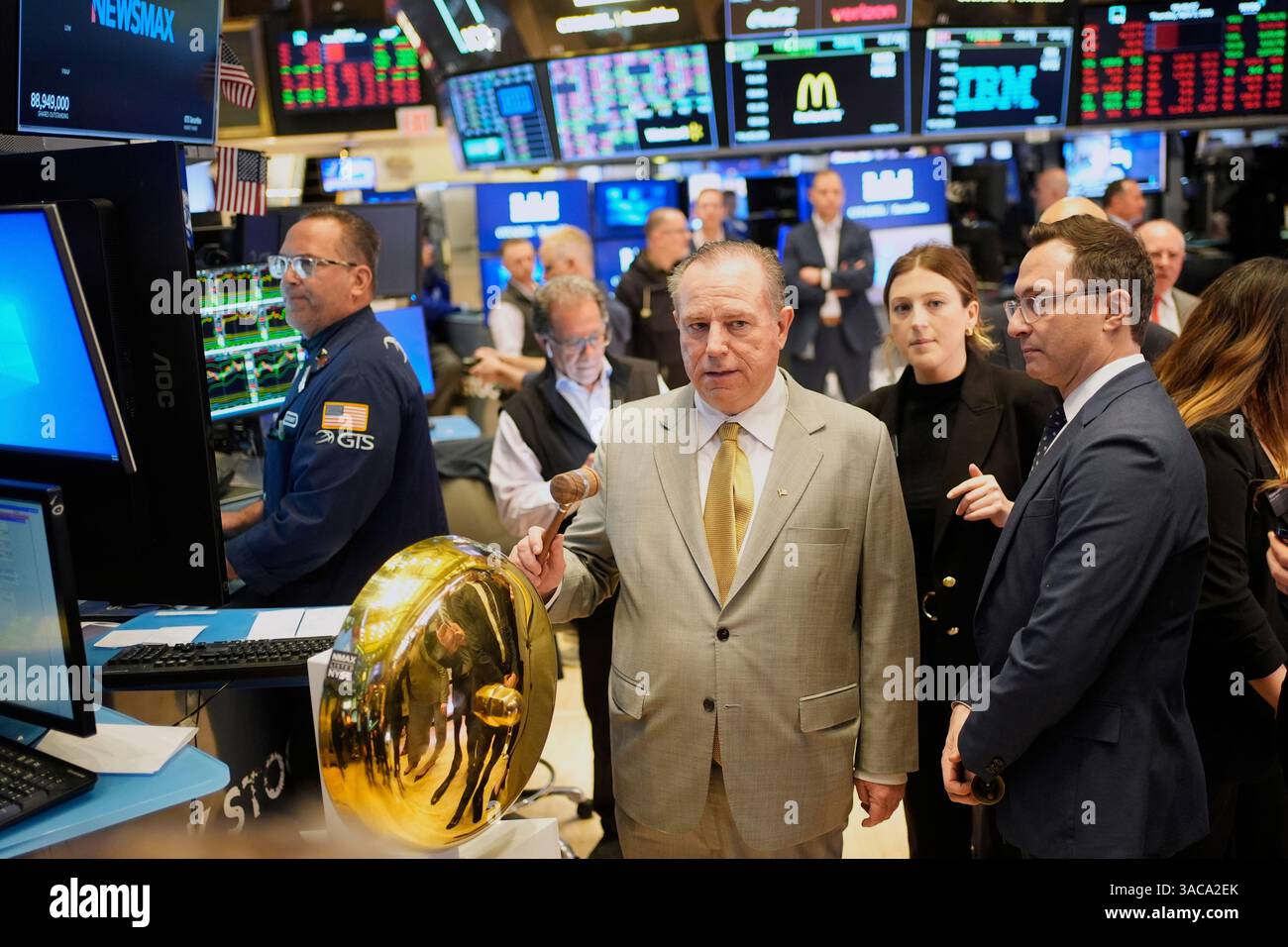 Newsmax CEO Christopher Ruddy poses for a picture on the floor at the ...