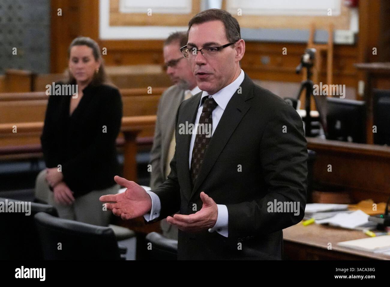 Prosecution attorney Hank Brennan addresses prospective jurors during ...