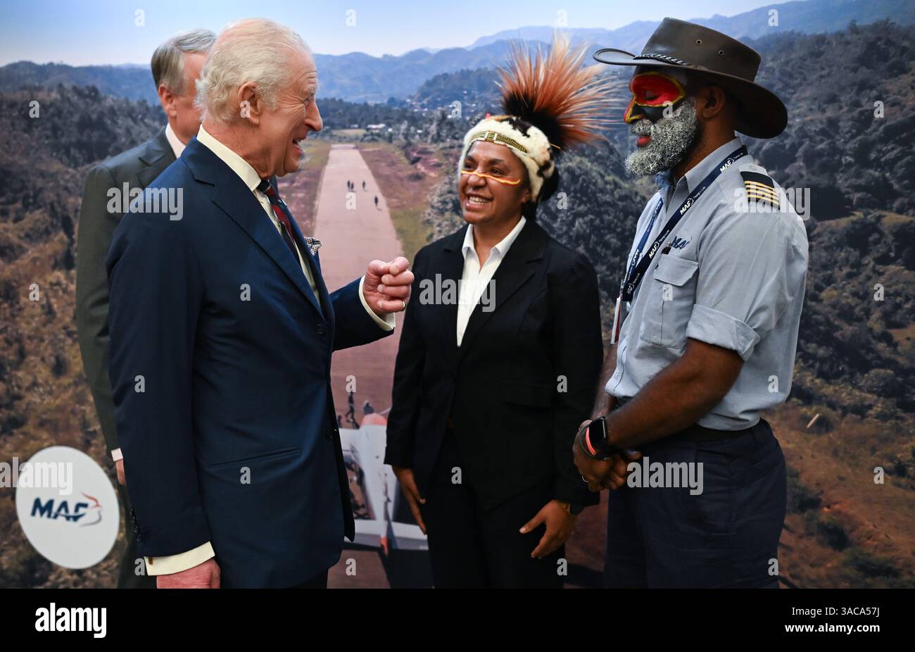 King Charles III with pilot Joseph Tua and Serah Michael MAF Flight ...