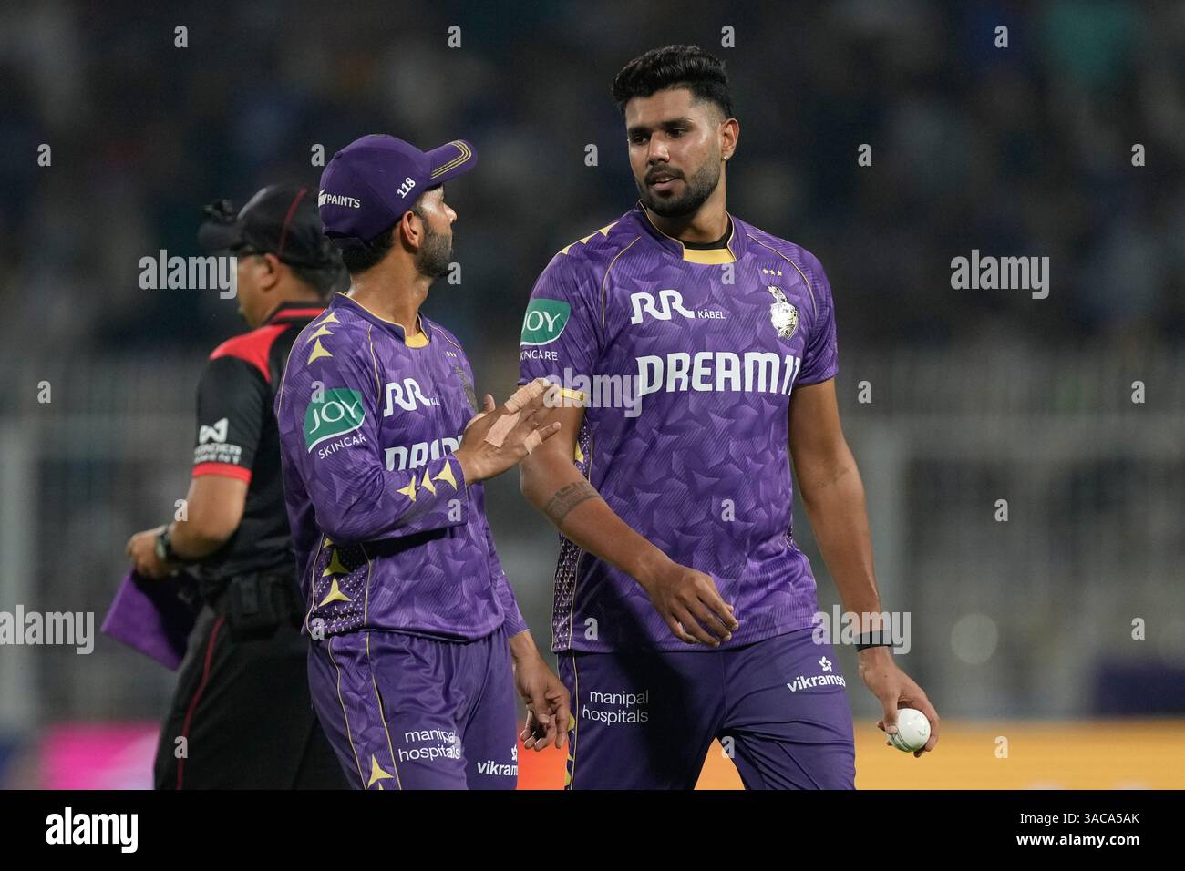 Kolkata Knight Riders' captain Ajinkya Rahane, left, chats with Kolkata ...