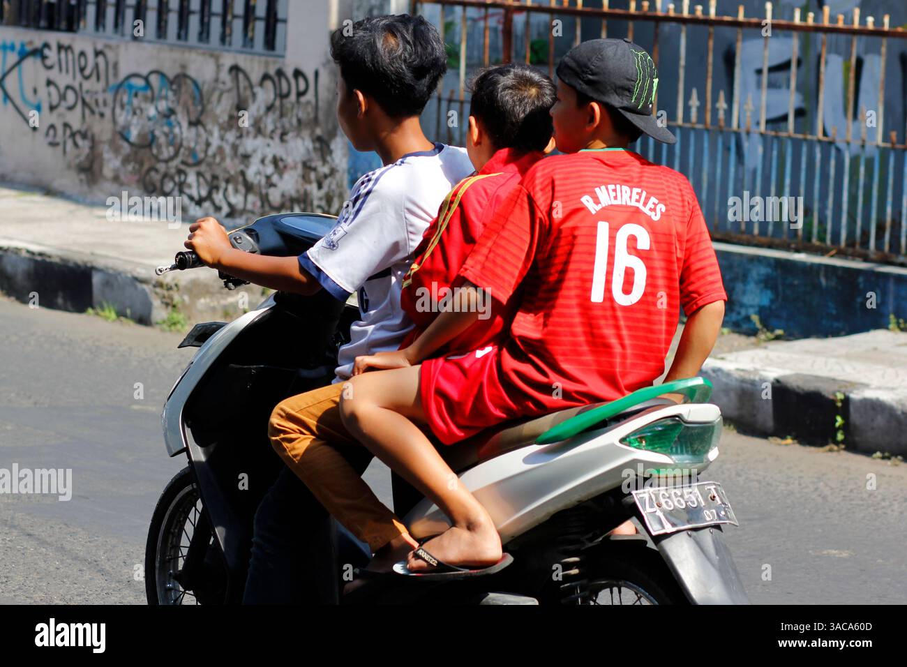 Children ride motorized bicycles hi-res stock photography and images ...