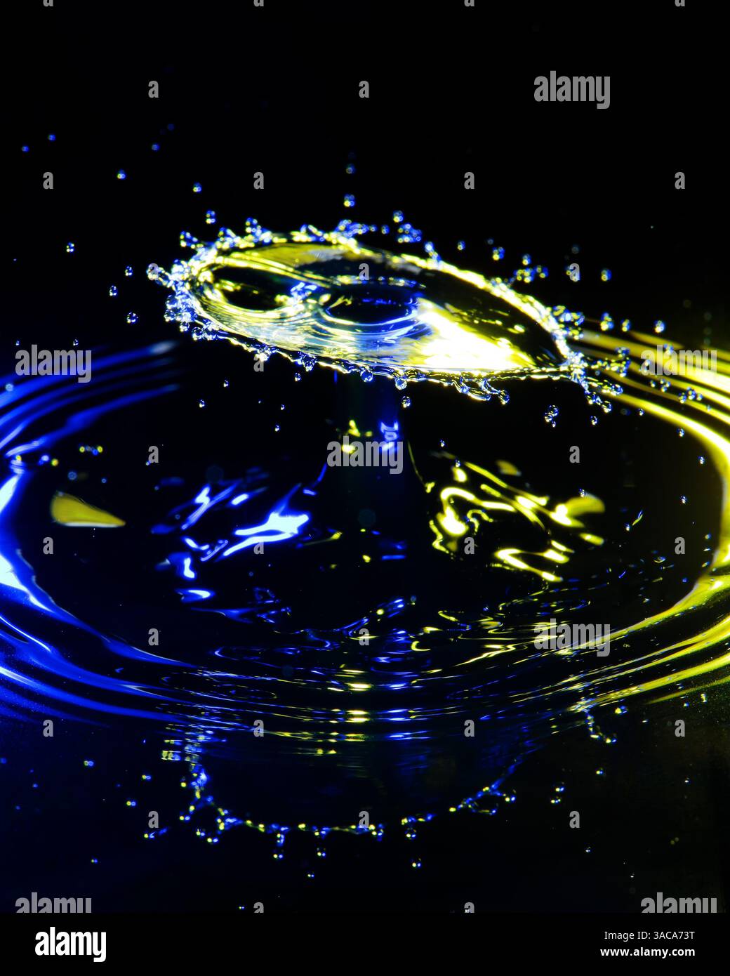 the exact moment when two drops of water collide in a container ...