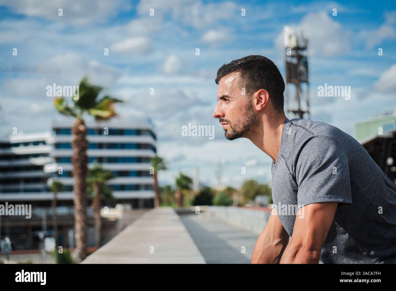 A pensive male figure intensely staring ahead, lost in thought and ...