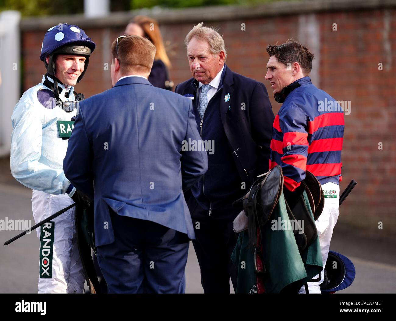 Dan Skelton speaking with Harry Cobden (left) as Nick and Harry Skelton ...