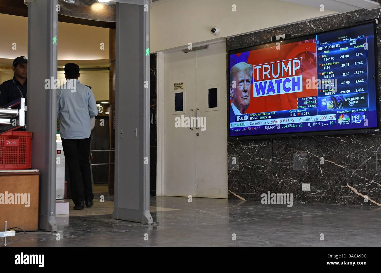 Mumbai, India. 03rd Apr, 2025. LED screen displays tariff news imposed ...