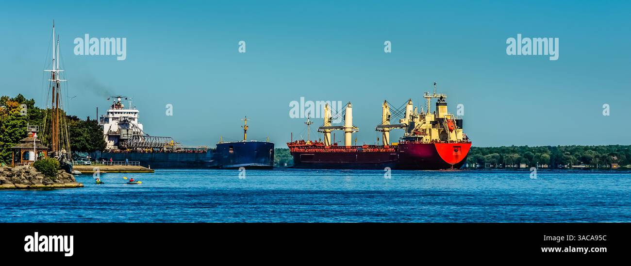 Two Freight Ships passing closely on the St. Lawrence River at ...