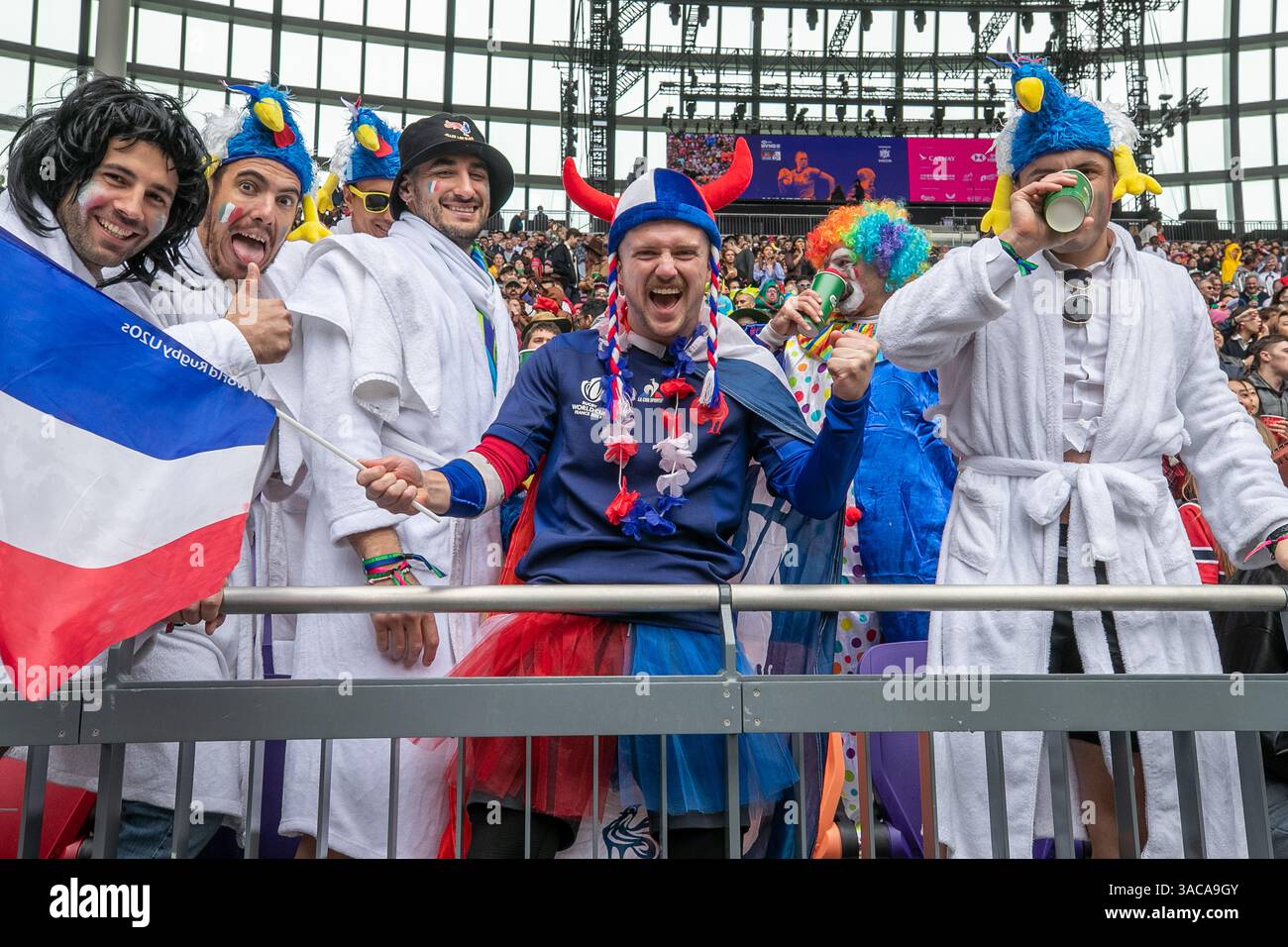 Fans dressed in various costumes during the Hong Kong Sevens at Kai Tak ...