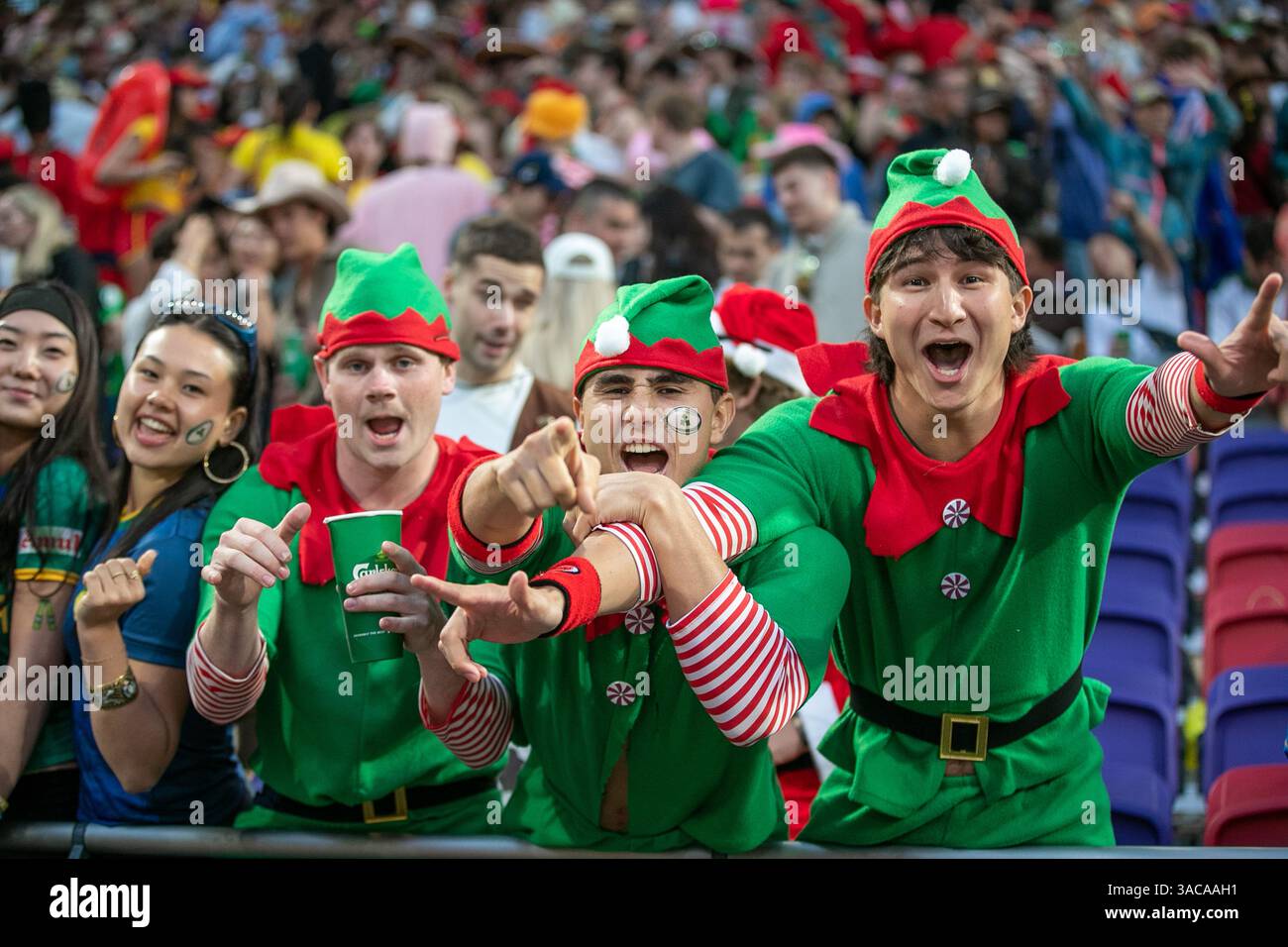 Fans dressed in various costumes during the Hong Kong Sevens at Kai Tak ...