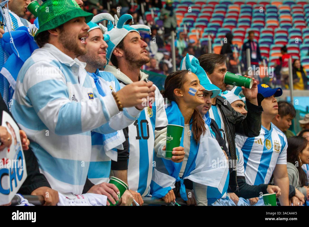 Fans dressed in various costumes during the Hong Kong Sevens at Kai Tak ...