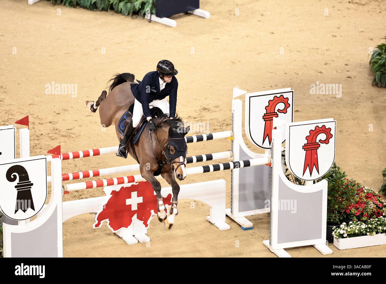 Adrian Schmid of Switzerland with Con Quality during the Prize of Land ...