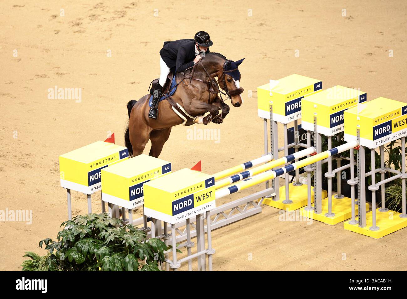 Christoph Könemann of Germany with Henry W during the Prize of Land ...